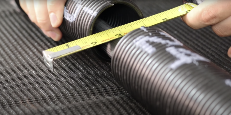 How to Determine Garage Door Spring Size (+Calculator)